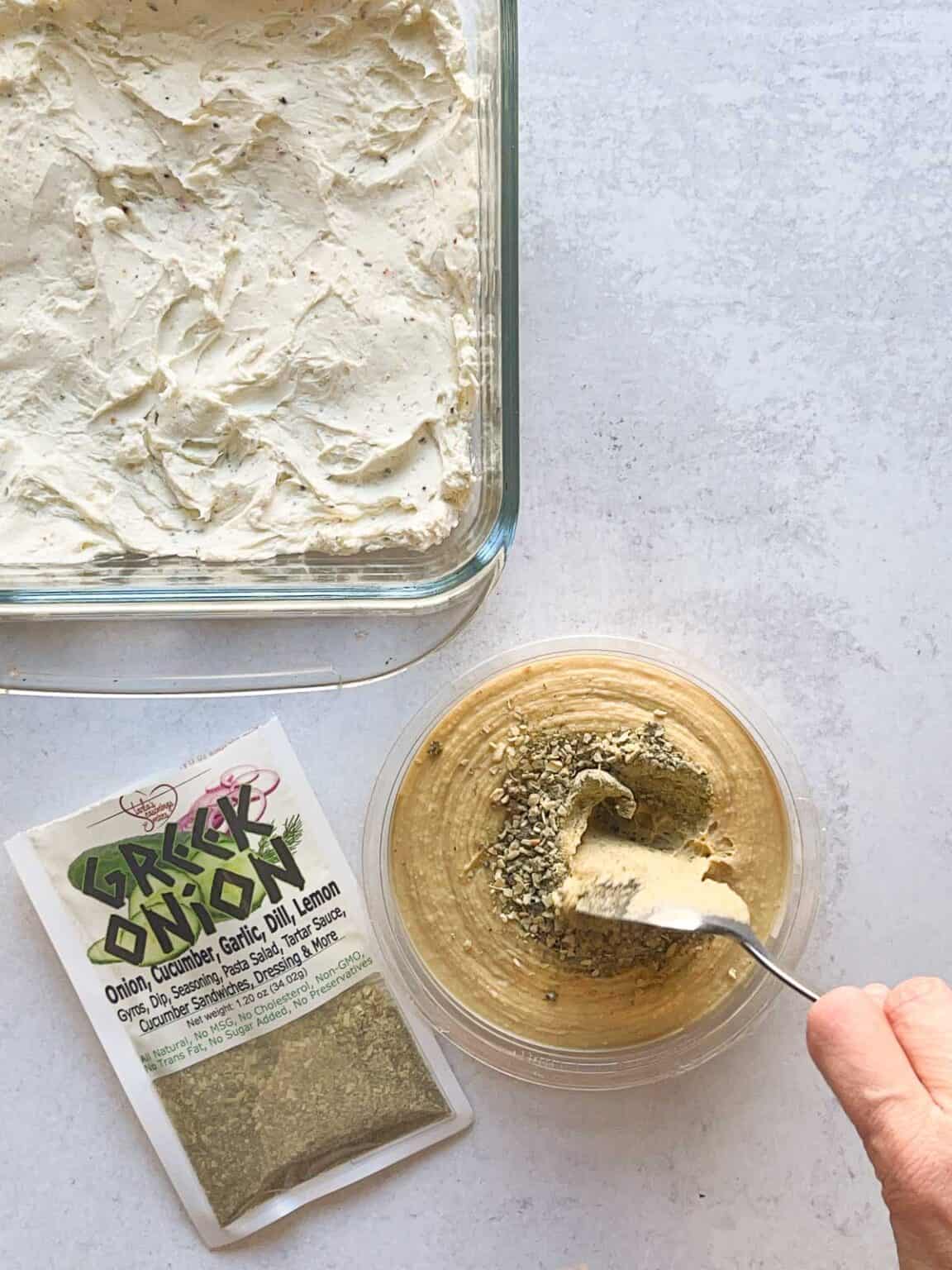 Greek 7 Layer Dip with Hummus - A Sprinkle and A Splash
